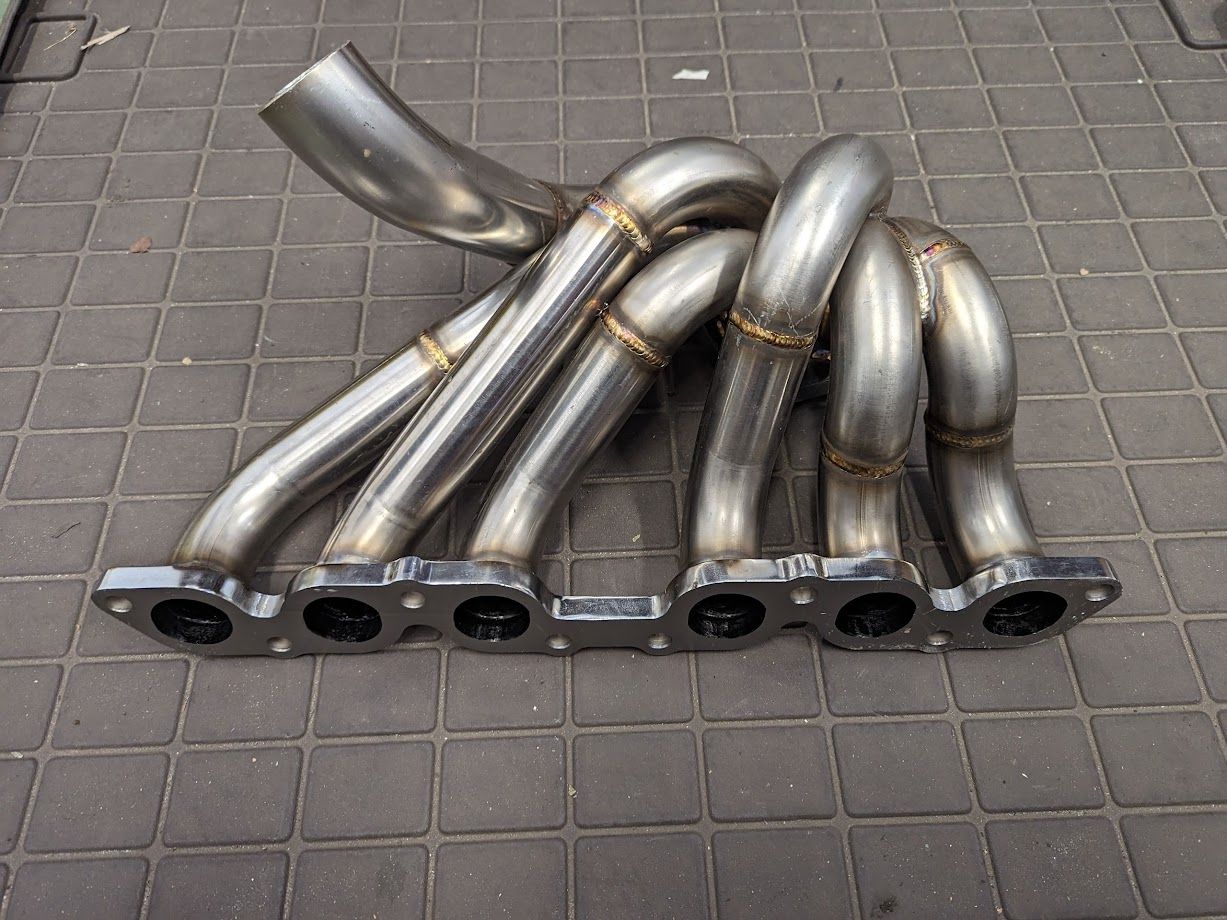 Turbo Manifolds & Down Pipes - 2JZGE T4 Divided Mid Frame Turbo Manifold
